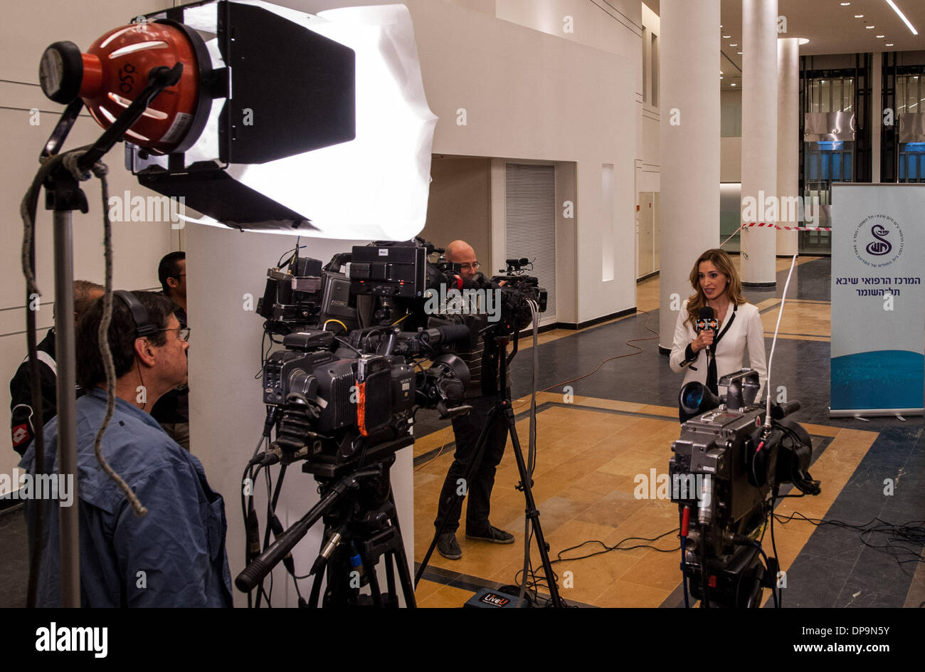 Tel Aviv, Israel. 10th Jan, 2014. A journalist gives a report at the ...