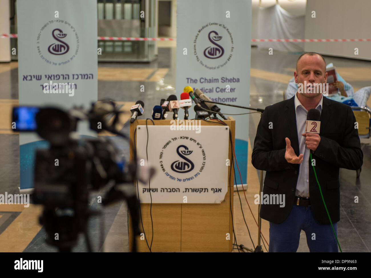 Tel Aviv, Israel. 10th Jan, 2014. A journalist gives a report at the ...