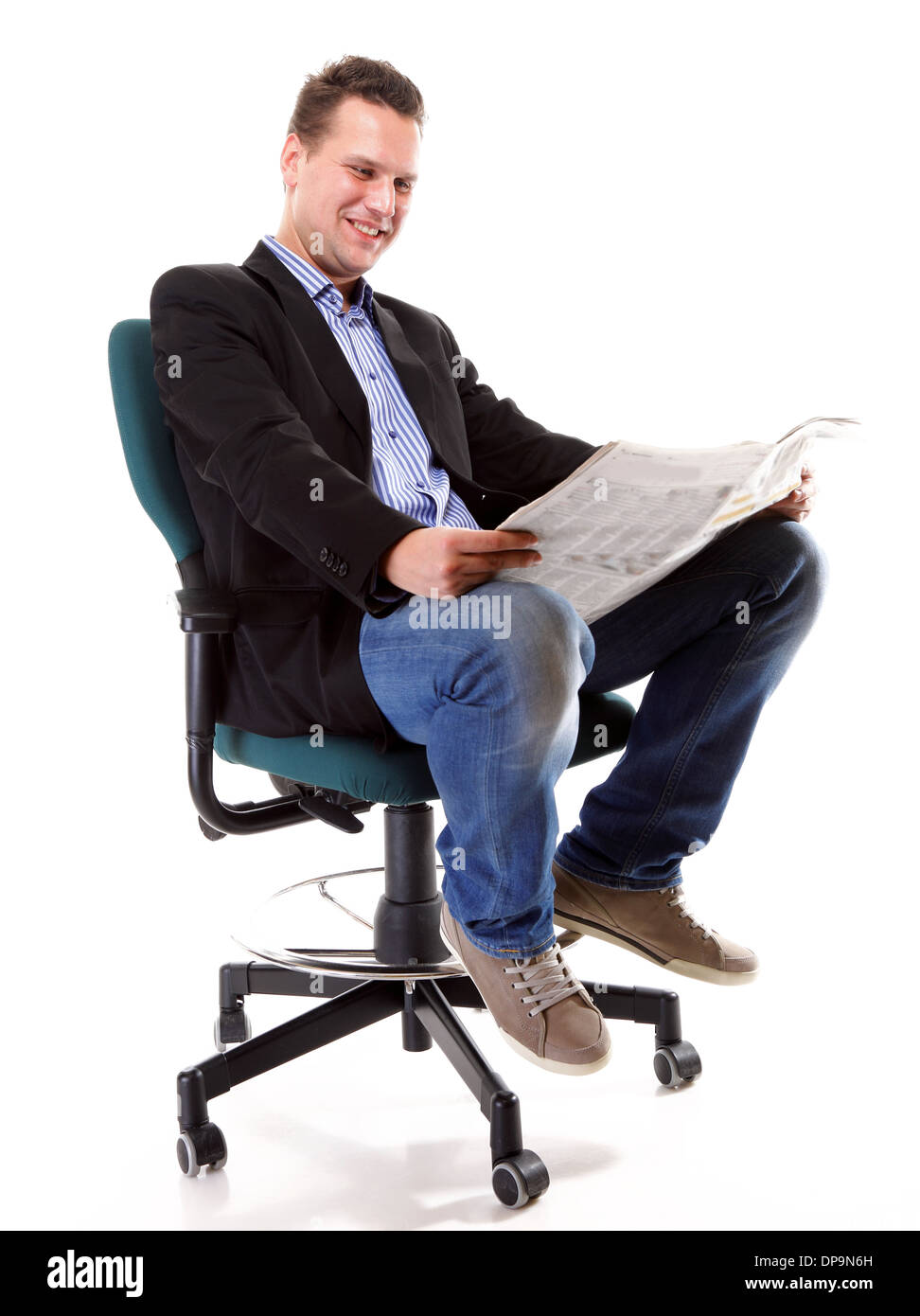 Full length businessman sitting on chair reading a newspaper isolated ...