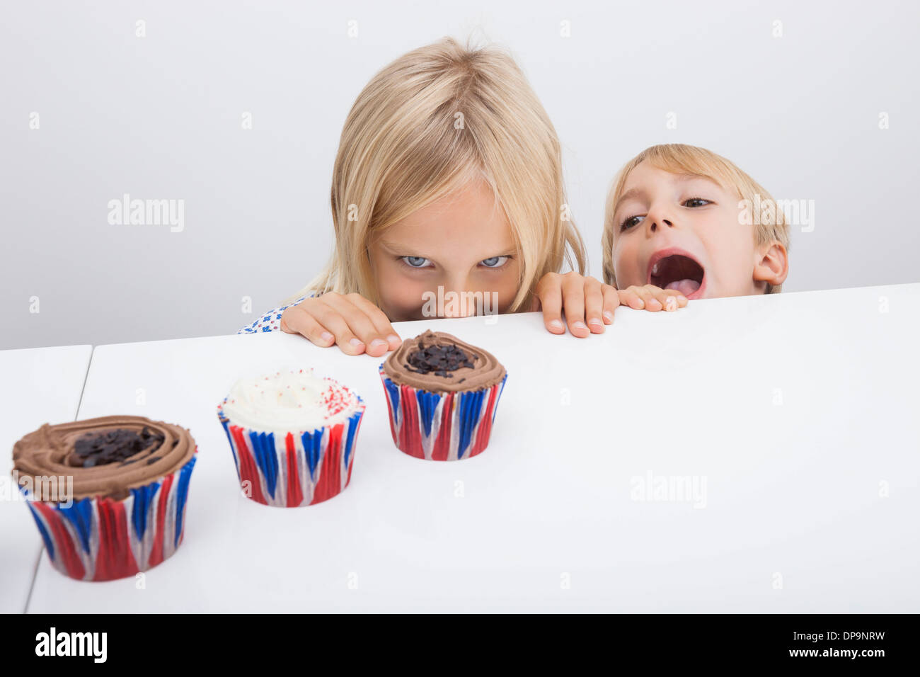 Child tempted by sweets hi-res stock photography and images - Alamy