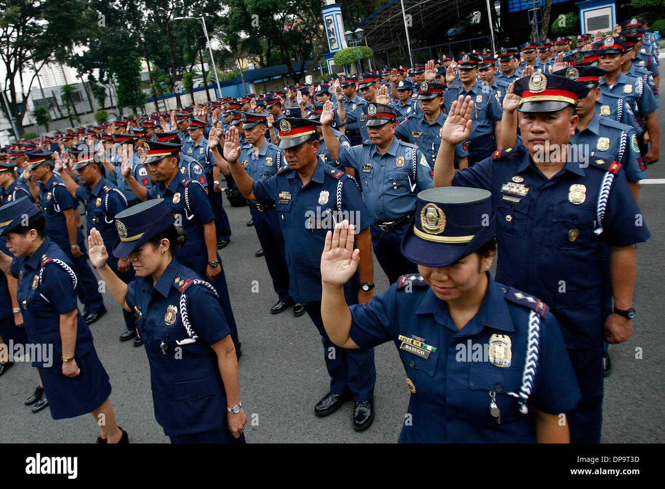 Quezon City, Philippines. 10th Jan, 2014. Newly-promoted policemen and ...
