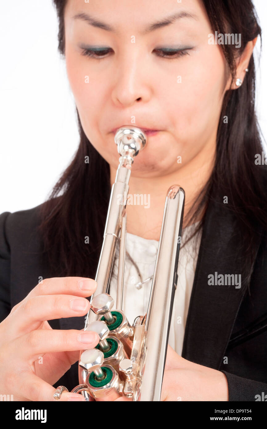 Portrait of a Female Trumpet Player - Isolated on White Stock Photo - Alamy