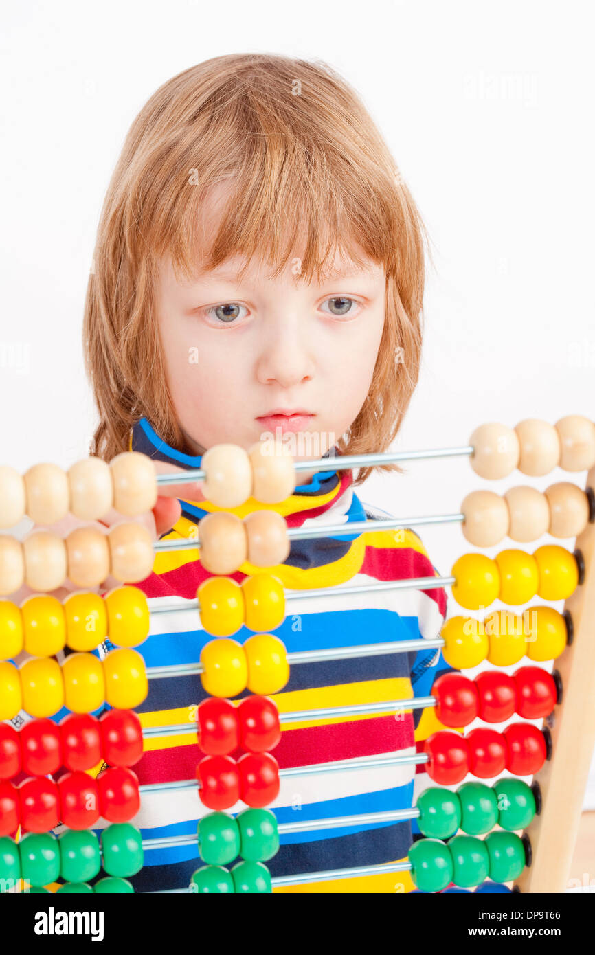 Boy Counting on Colorful Wooden Abacus - Isolated on White Stock Photo ...