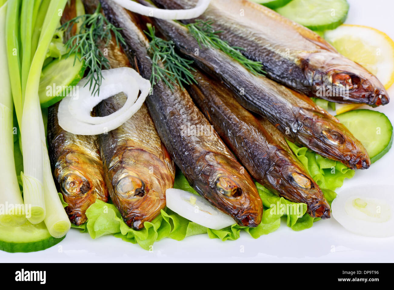 Smoked fish, salad and onion Stock Photo - Alamy