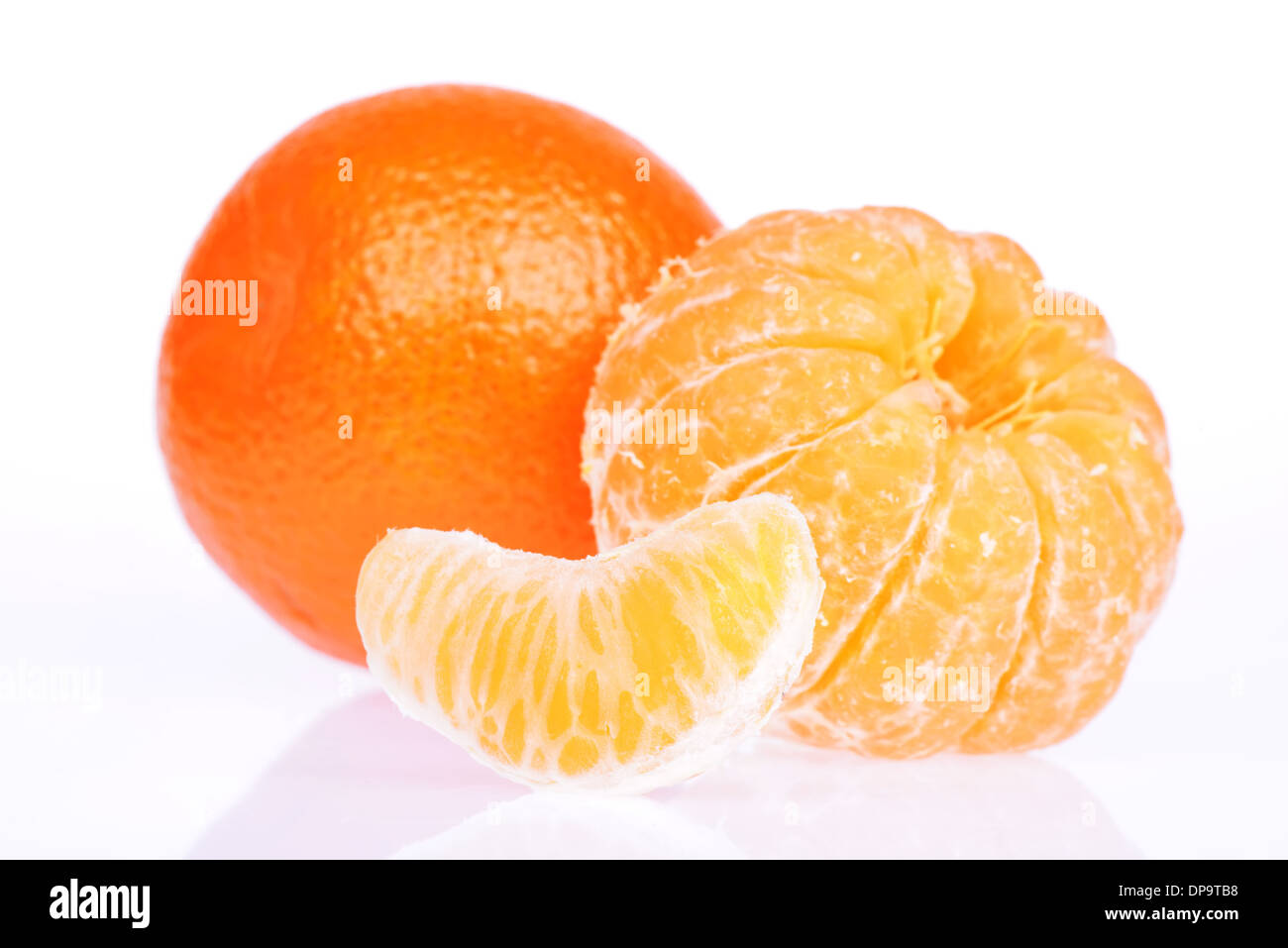 Closeup of peeled and unpeeled whole mandarin Cut Out Stock Images ...