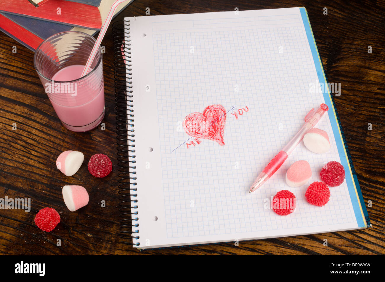College romance, heart shaped scribbling in a notebook Stock Photo - Alamy