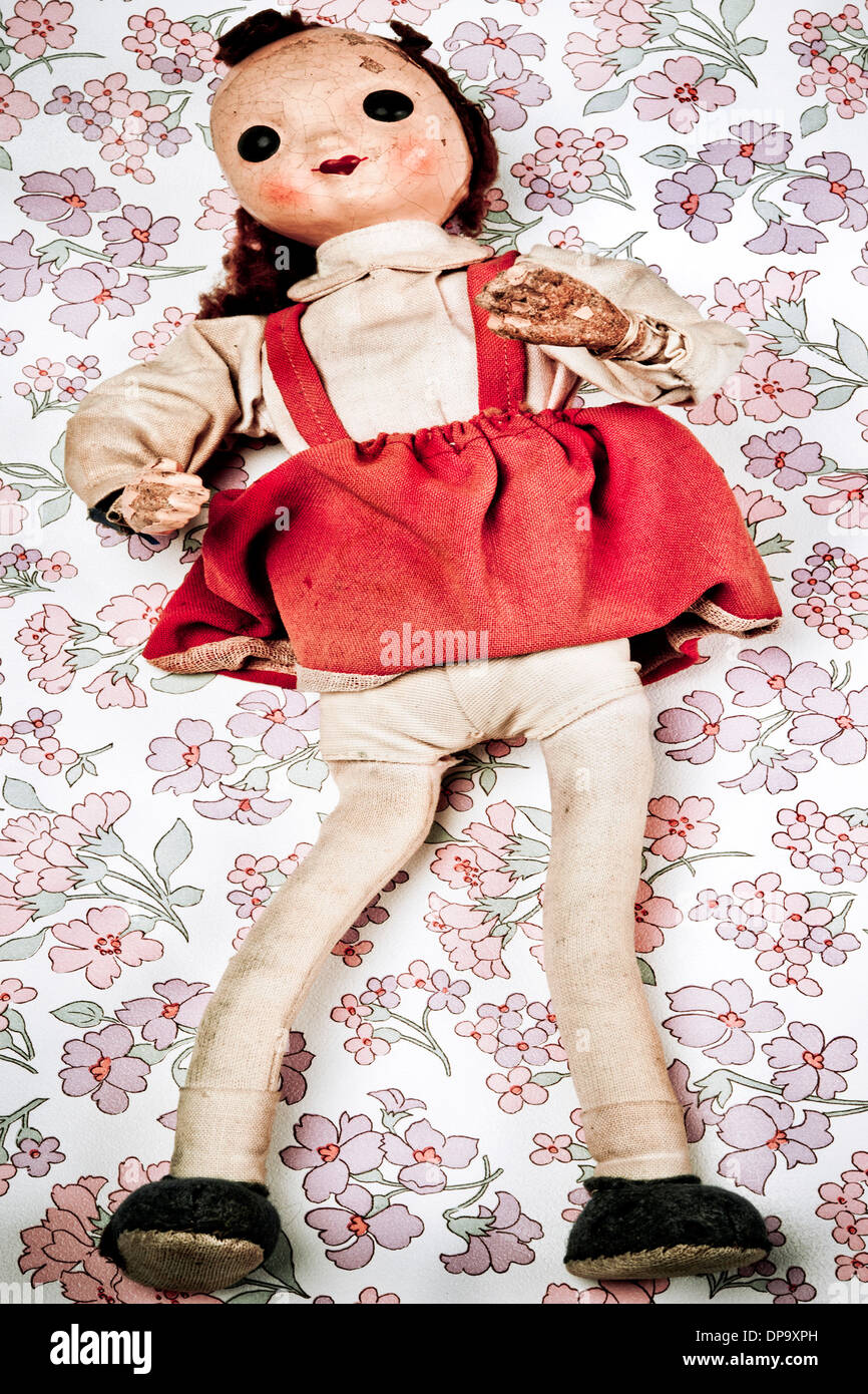 spooky old damaged doll Stock Photo - Alamy