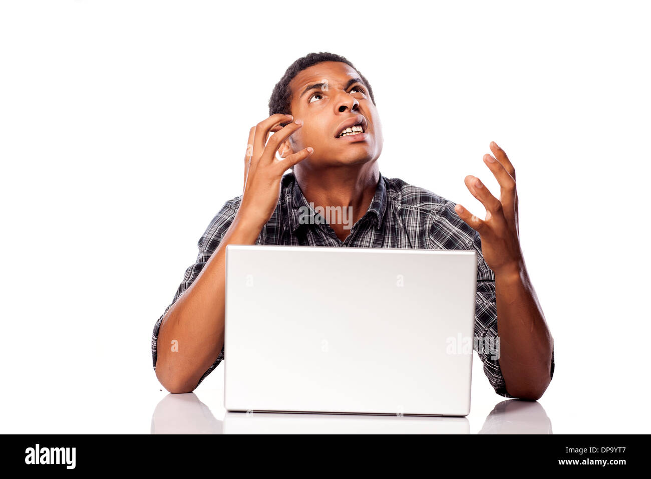 dark-skinned young man desperate and helpless gesture Stock Photo - Alamy