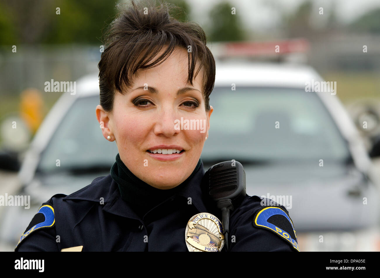 Female police officer smiling hi-res stock photography and images - Alamy