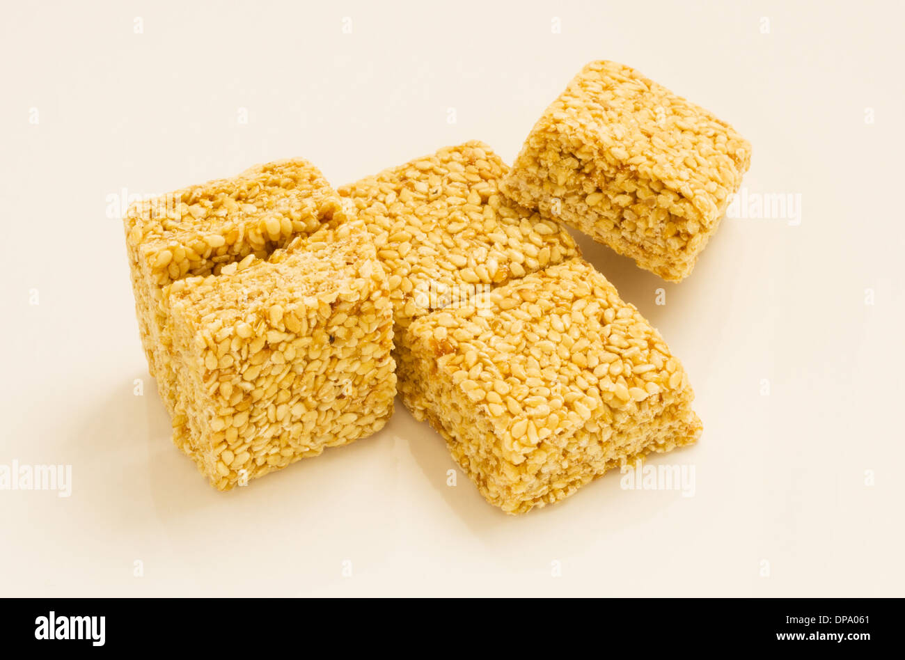 Beautiful photo of sesame sweets on a white background Stock Photo - Alamy