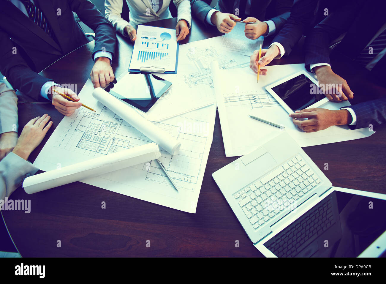 Image of human hands during paperwork at meeting Stock Photo - Alamy