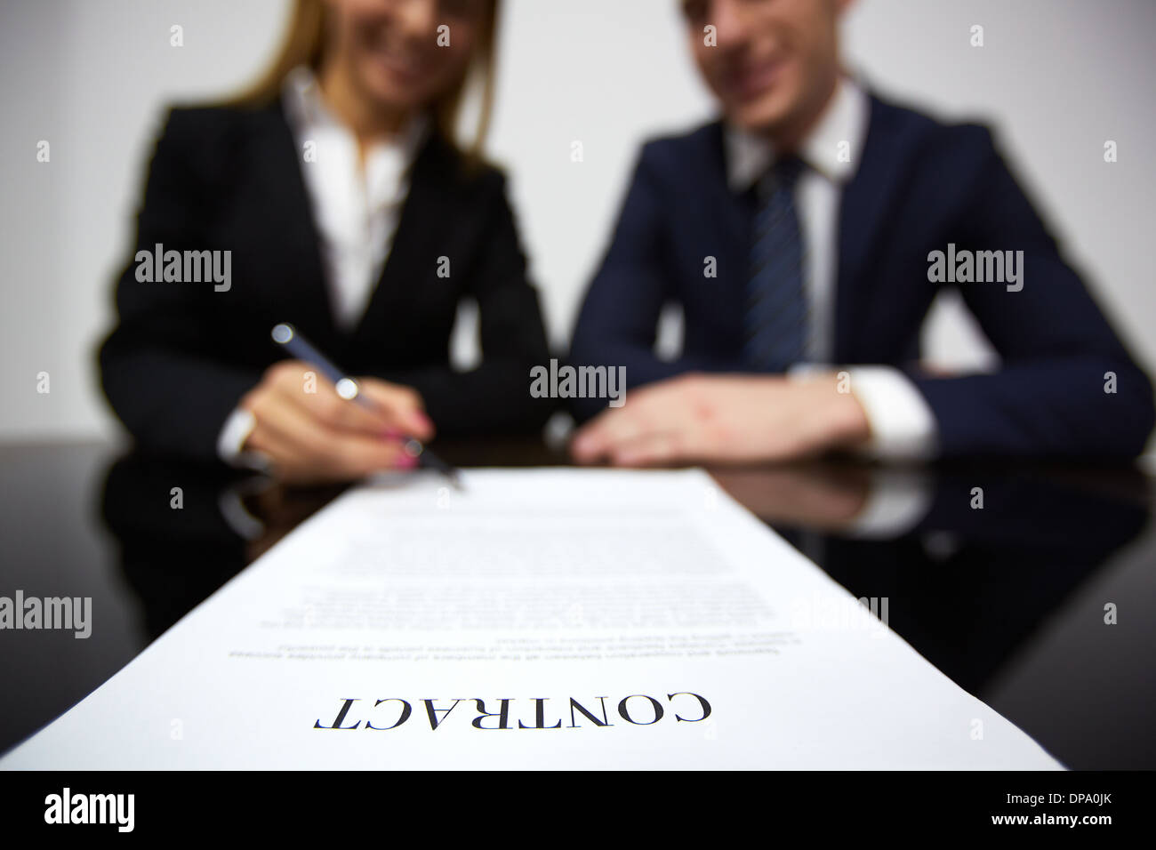Image of human hands during signing contract Stock Photo - Alamy