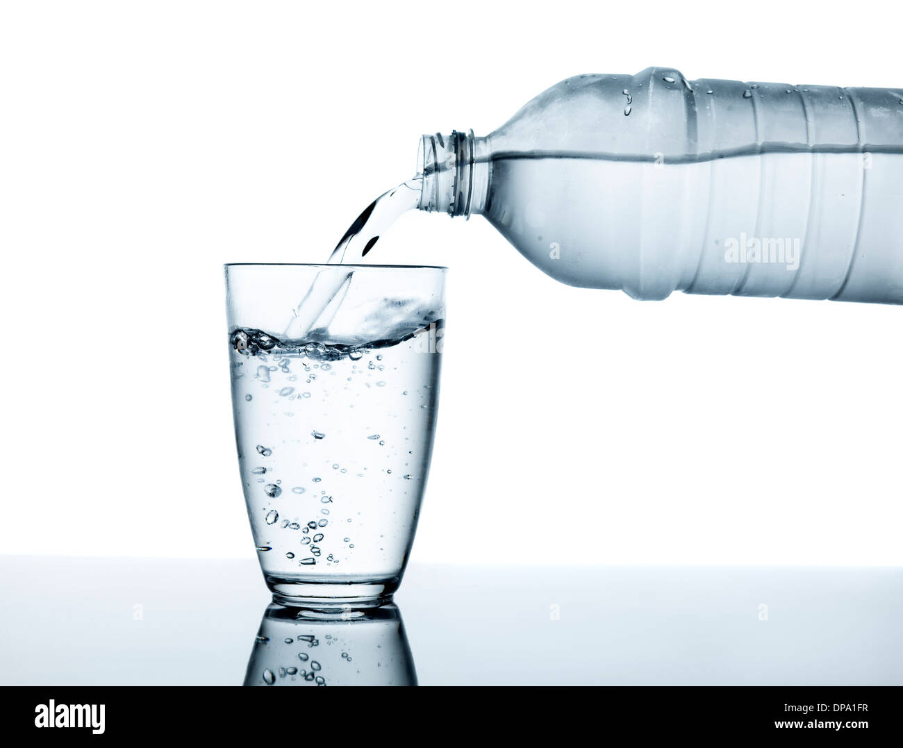 moment in which it pours pure sparkling water in a glass Stock Photo - Alamy