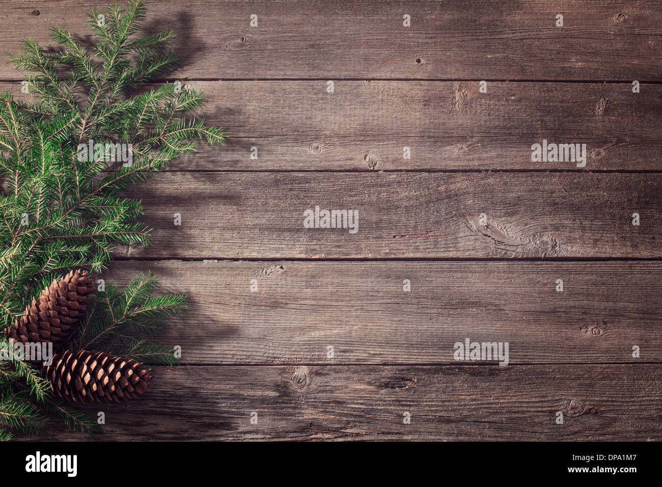Christmas tree on wooden background Stock Photo - Alamy