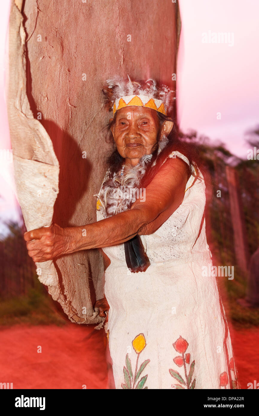 Old woman of tribe Ticuna in ceremony, Puerto Nariño, Amazons river ...