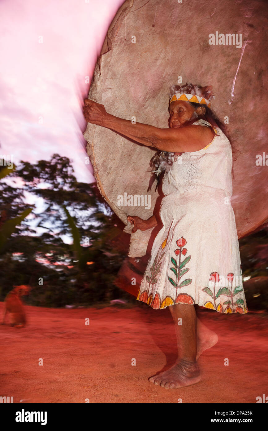 Old woman of tribe Ticuna in ceremony, Puerto Nariño, Amazons river ...