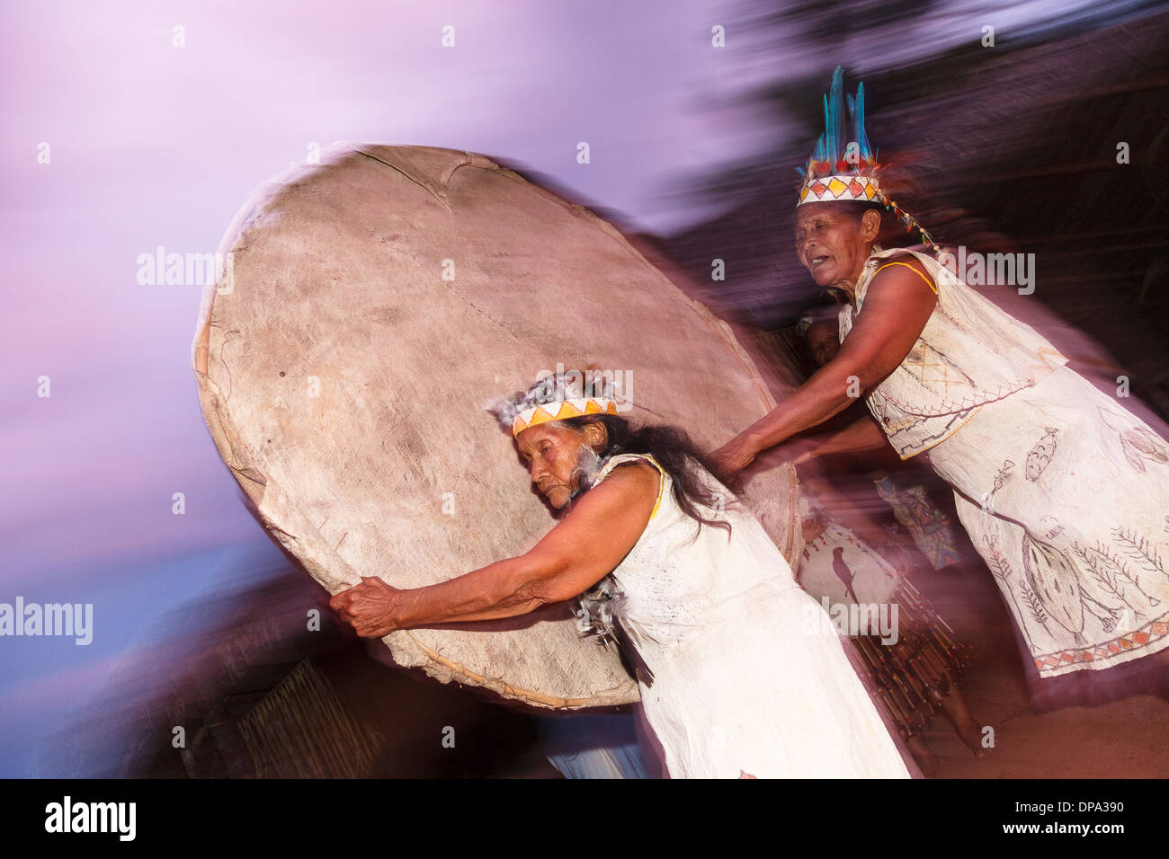 Old woman of tribe Ticuna in ceremony, Puerto Nariño, Amazons river ...