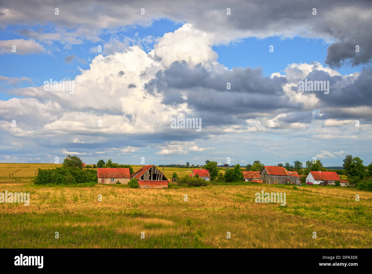 Scenic view on summer landscape in rural Poland with an old farmhouse ...