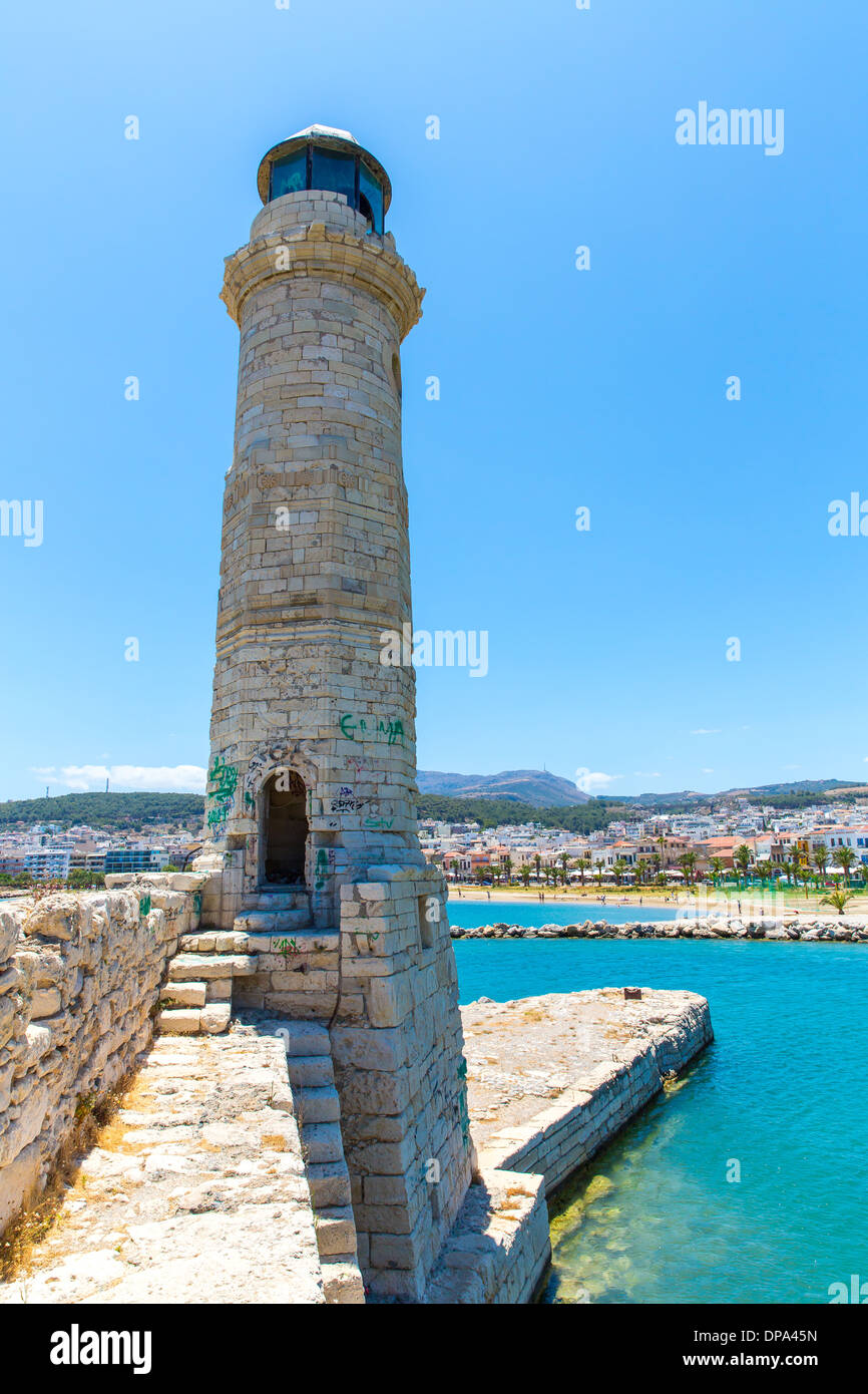 Old venetian lighthouse at harbor. Rethymno, Crete, Greece Stock Photo ...