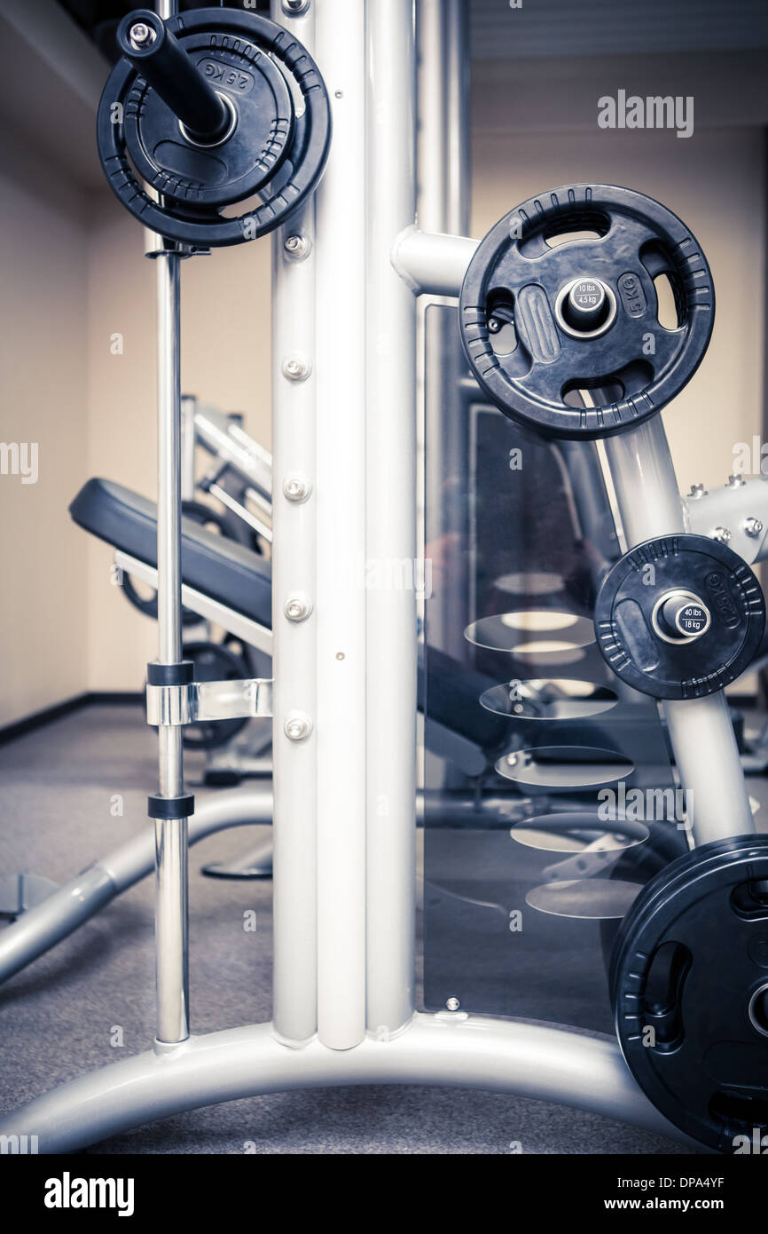 diverse equipment and machines at the gym room Stock Photo - Alamy