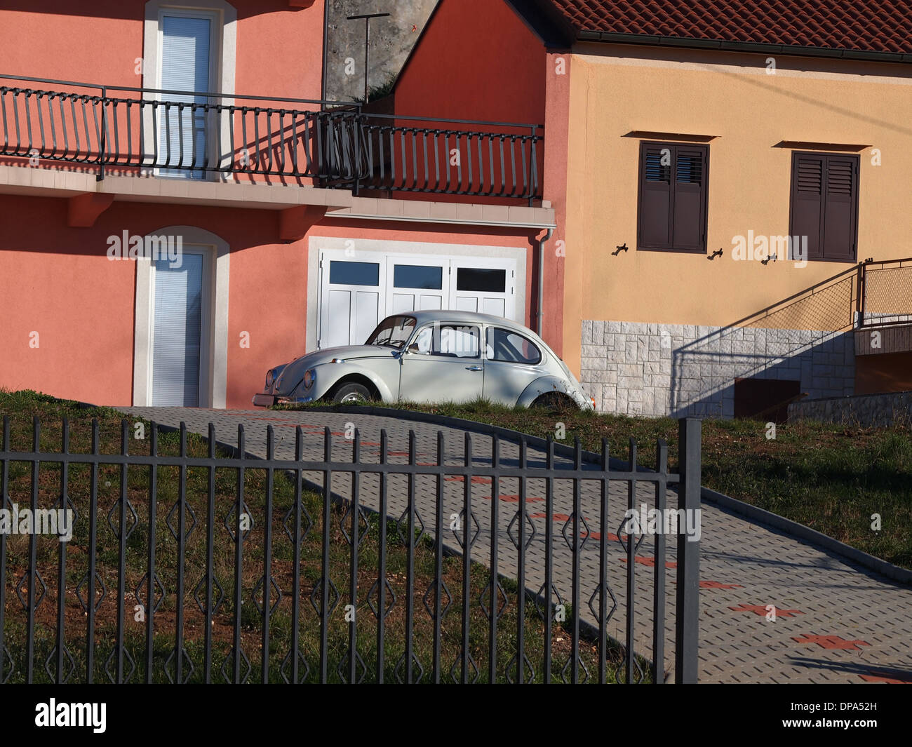 retro car in front of family house Stock Photo - Alamy