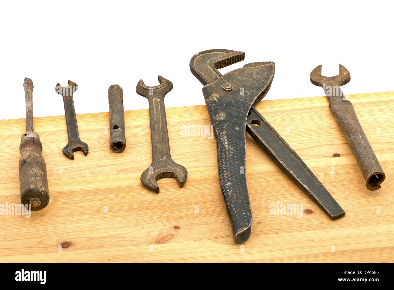 old used tools on the wooden desk Stock Photo - Alamy