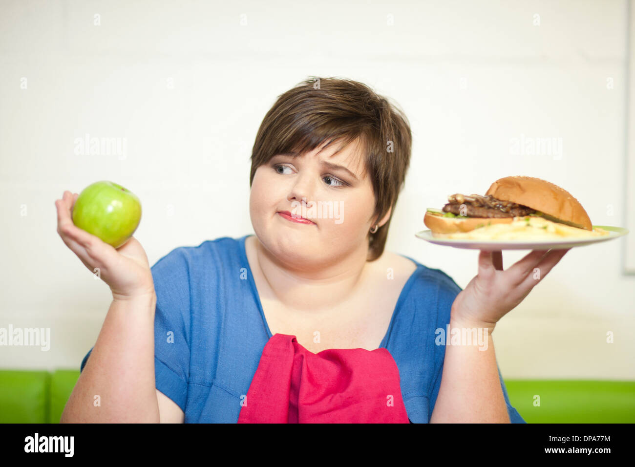 Eating burger woman overweight hi-res stock photography and images - Alamy