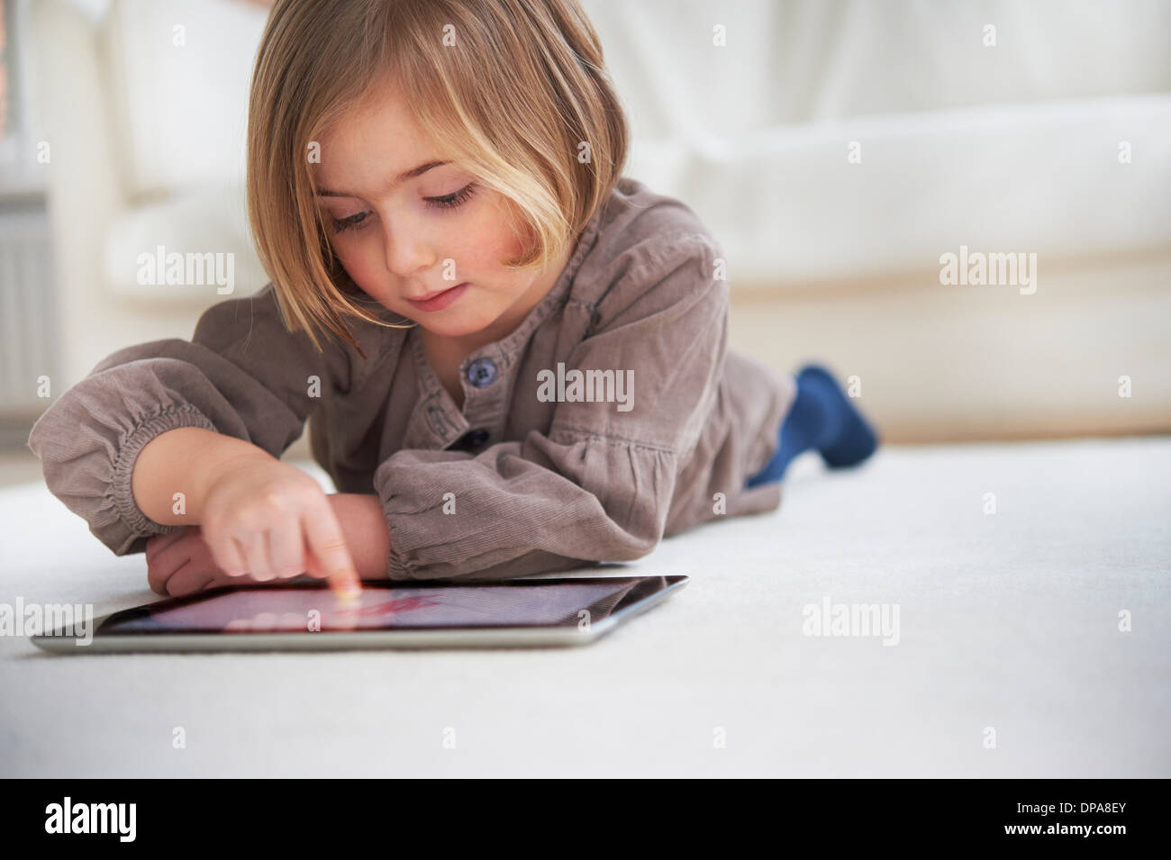 Tablet lying on floor hi-res stock photography and images - Alamy