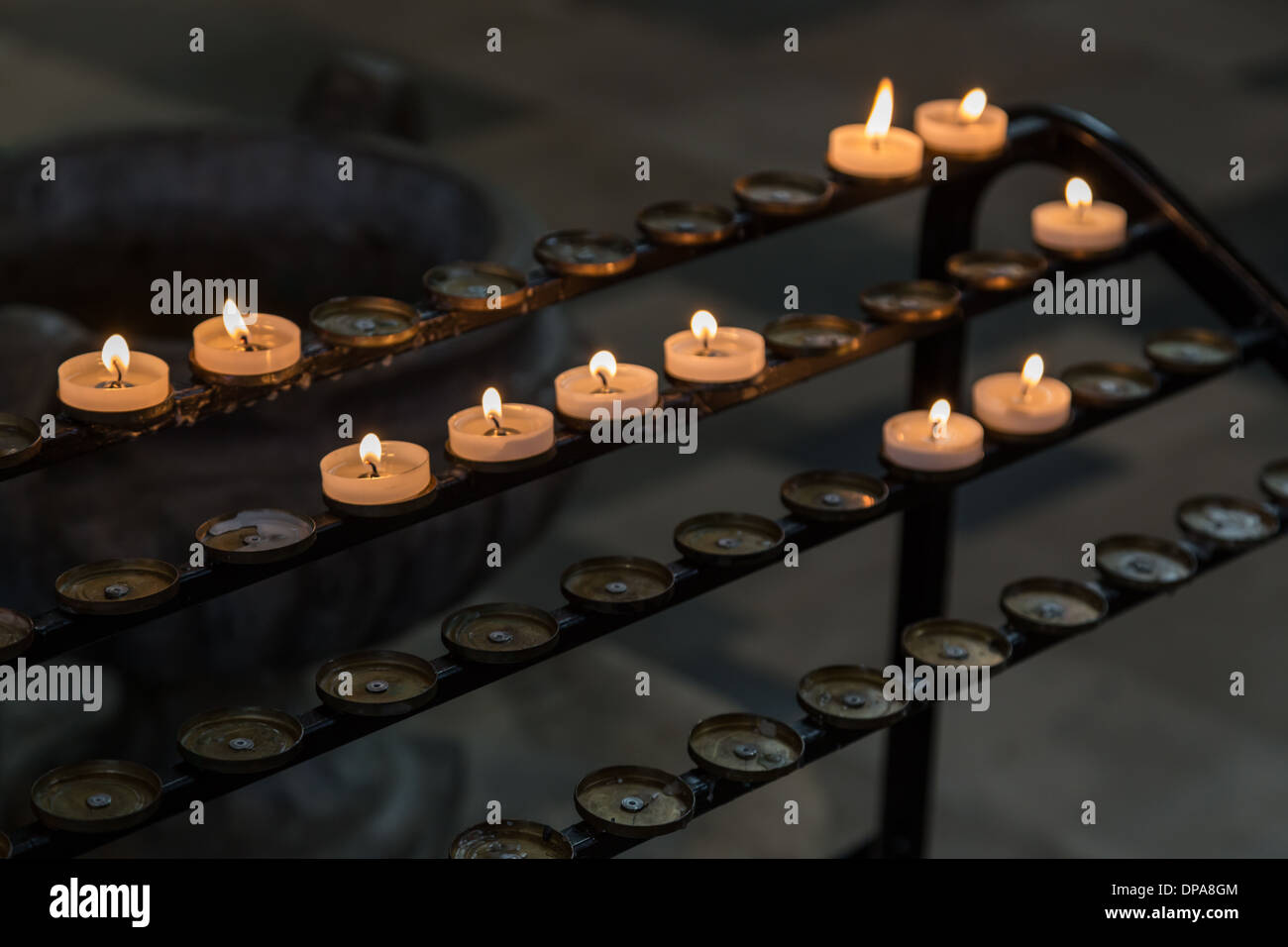 Rack of candles hi-res stock photography and images - Alamy