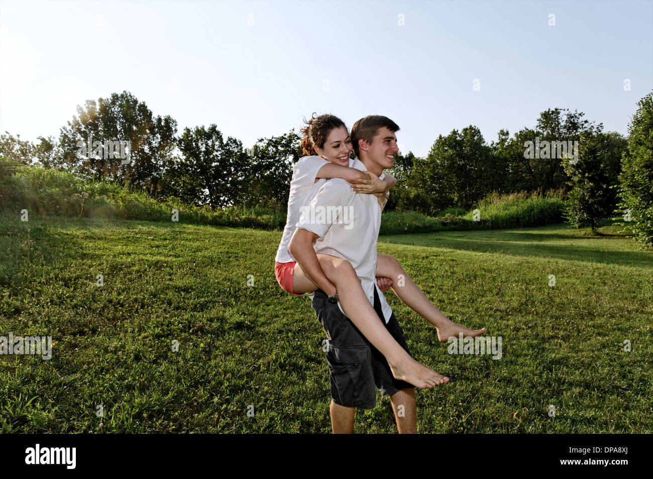 Giving piggyback ride hi-res stock photography and images - Alamy