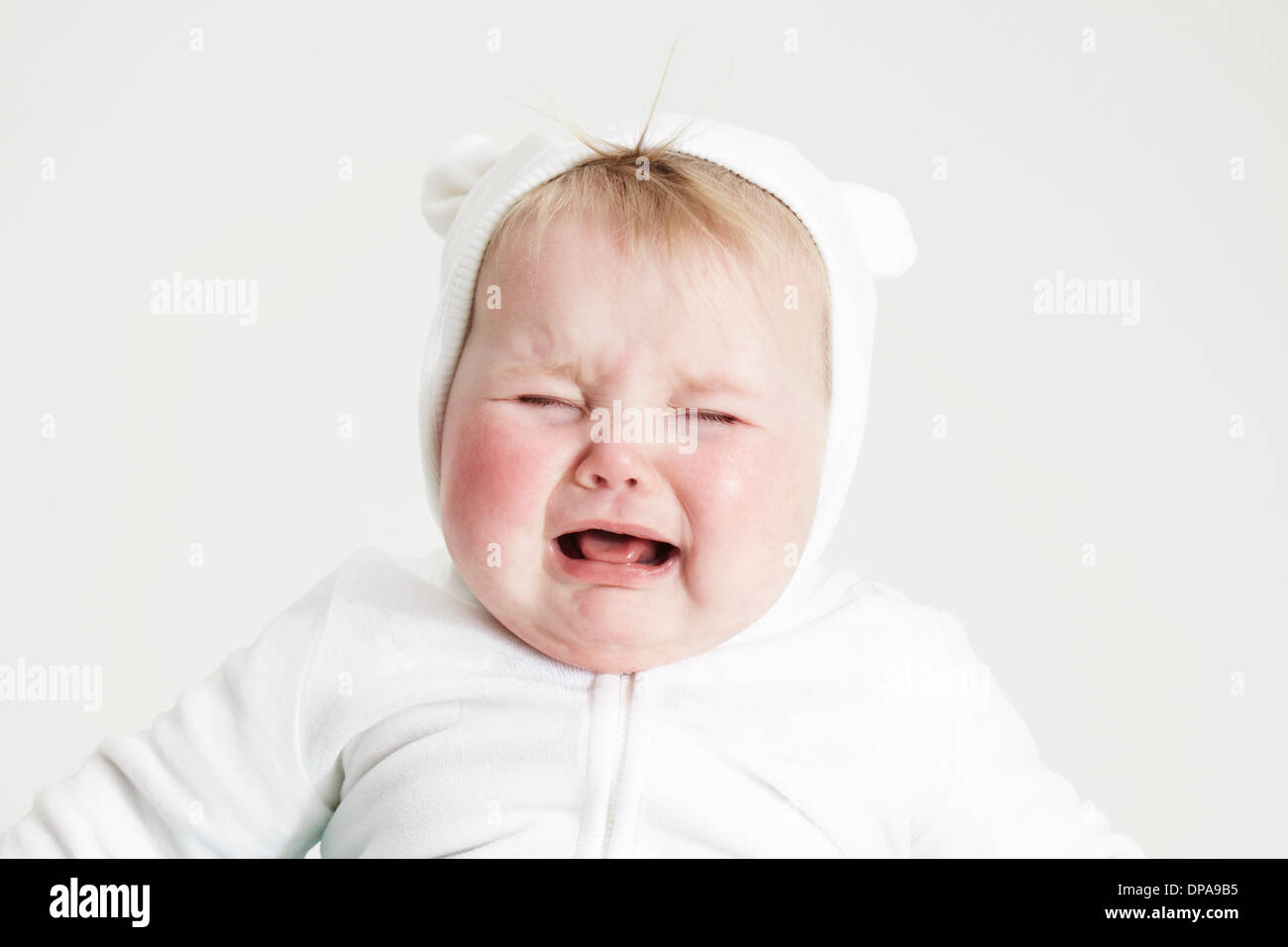 Baby girl crying Stock Photo - Alamy
