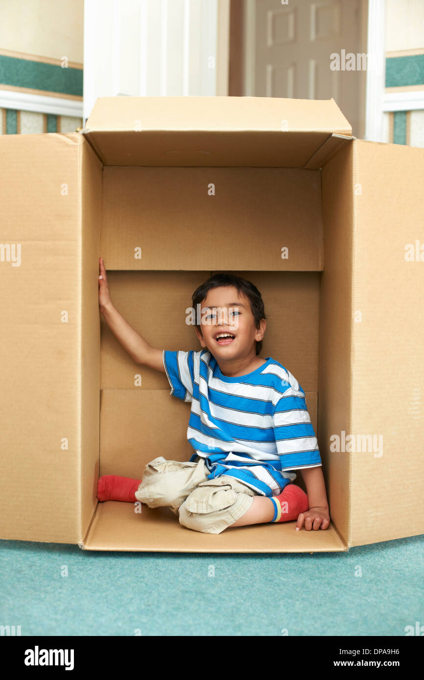Boy in the box hi-res stock photography and images - Alamy