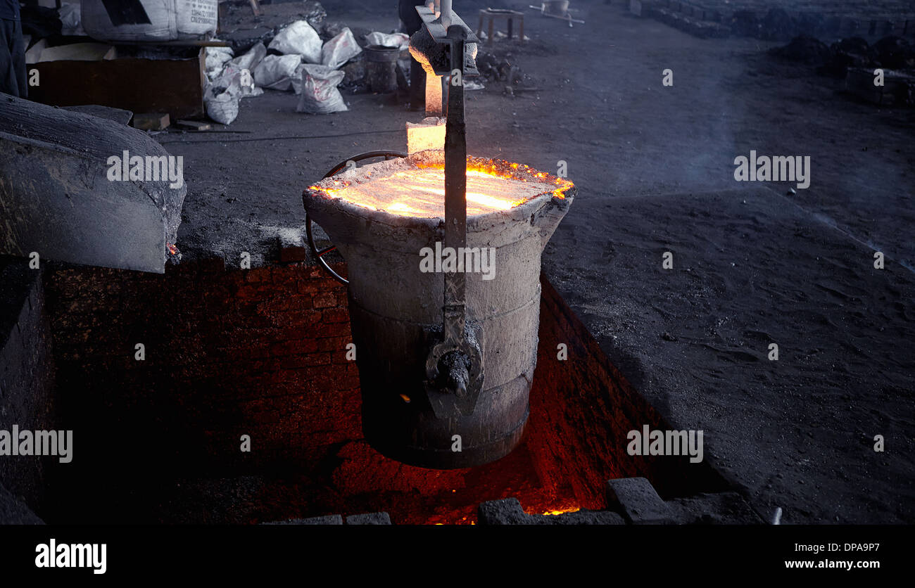 Working in cast iron foundry Stock Photo - Alamy