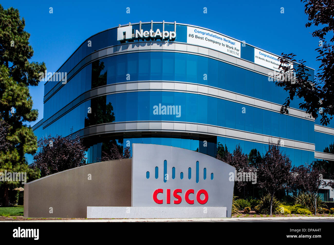 A NetApp building with a Cisco sign placed in front created by ...