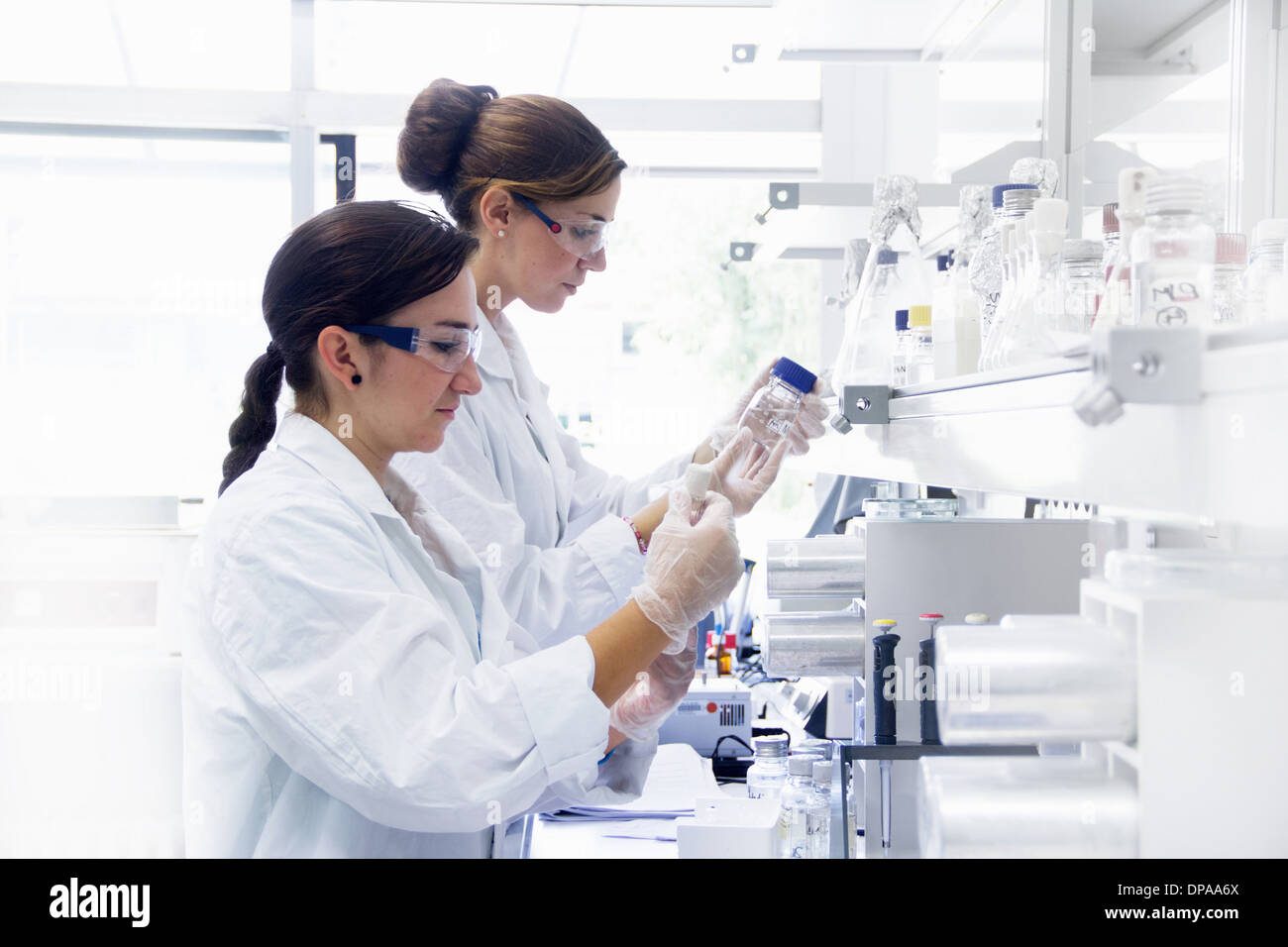 Biology students working in lab Stock Photo - Alamy