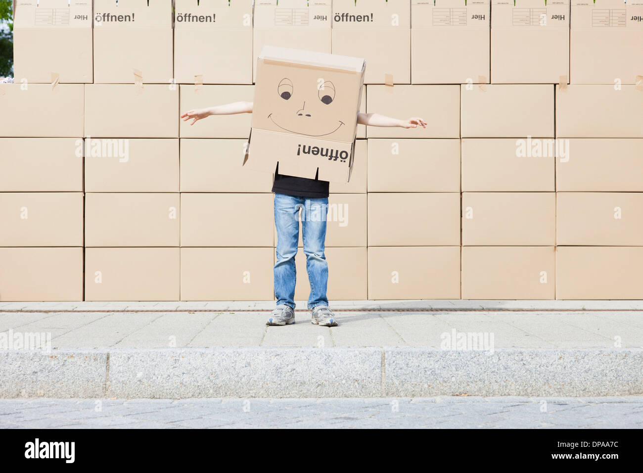 Man wearing cardboard box covering his head Stock Photo - Alamy