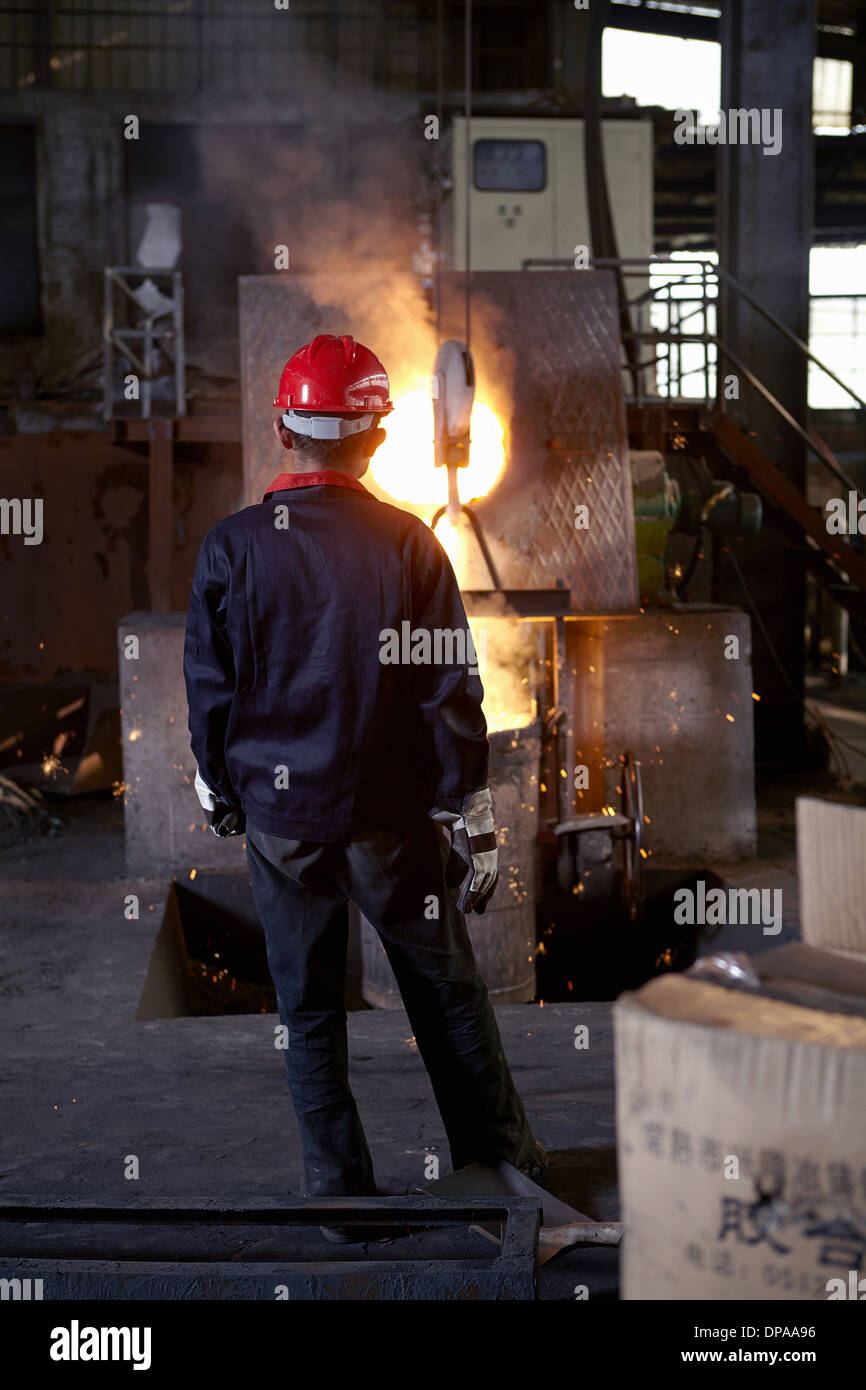 Working in cast iron foundry Stock Photo - Alamy