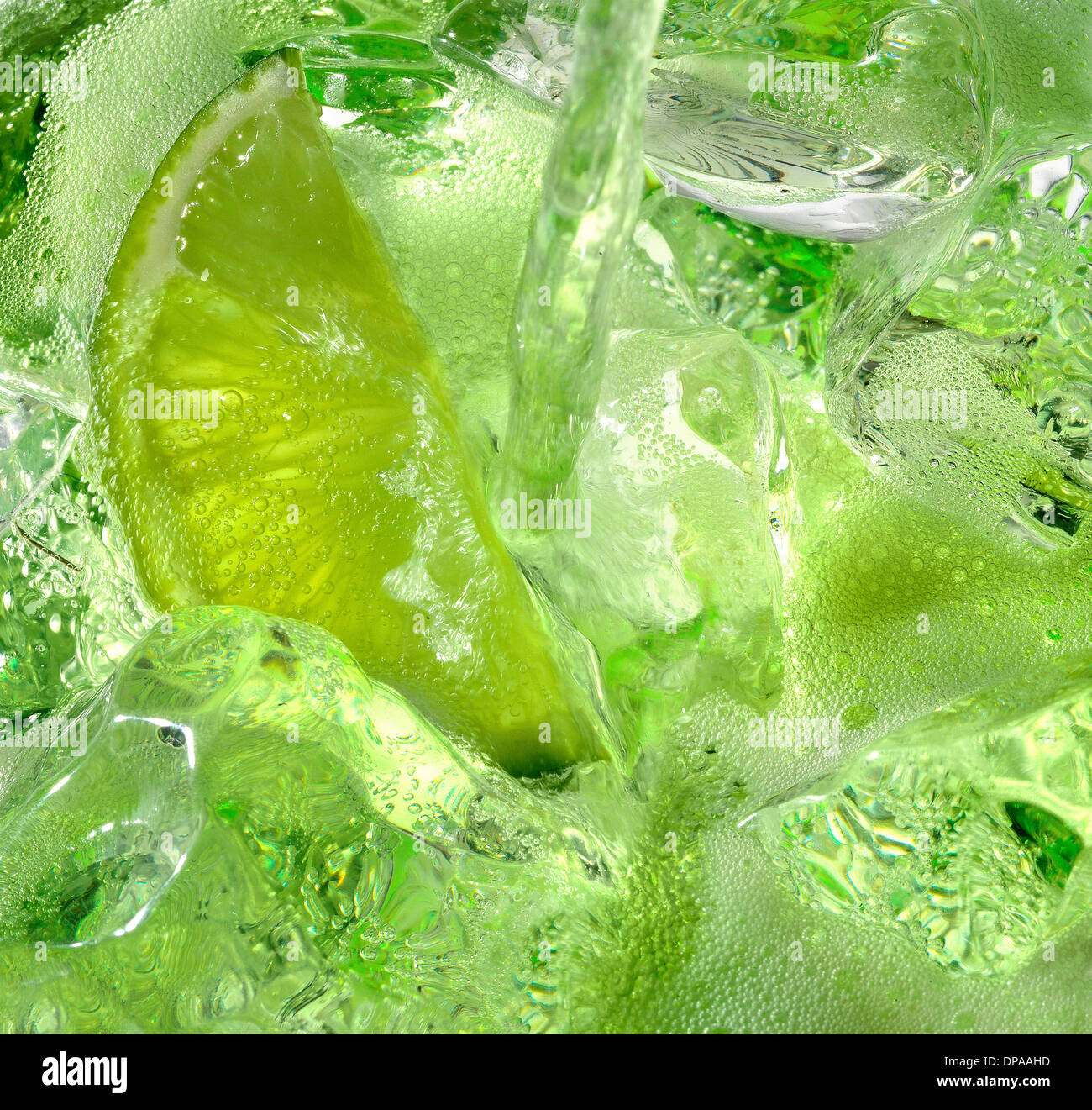 Pouring lime juice Stock Photo - Alamy