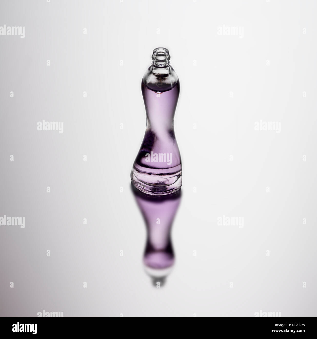 Bottle of perfume with reflection Stock Photo - Alamy