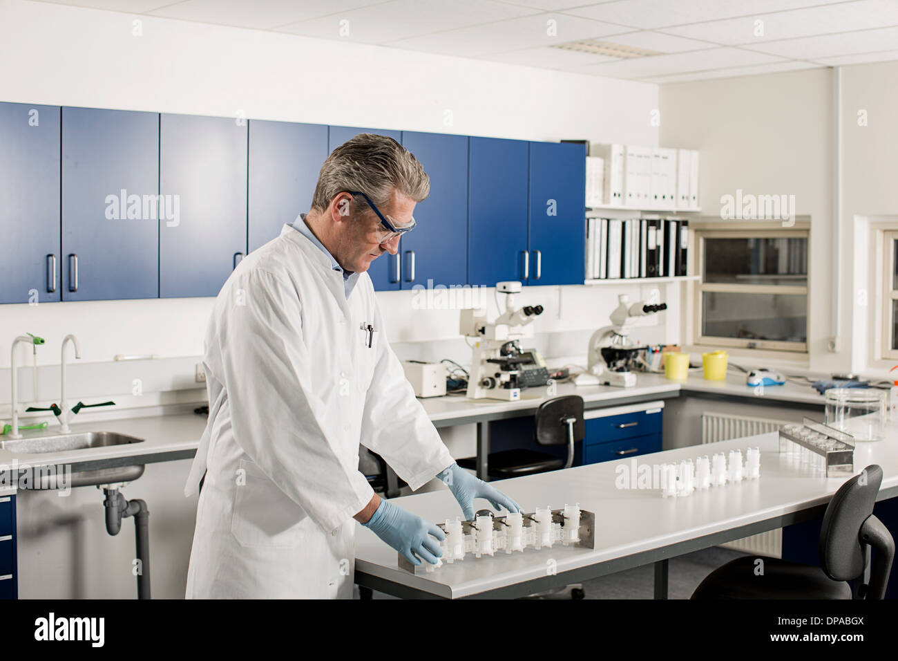 Working at scientist hi-res stock photography and images - Alamy