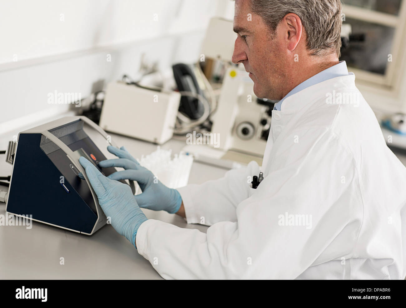 Using lab equipment hi-res stock photography and images - Alamy