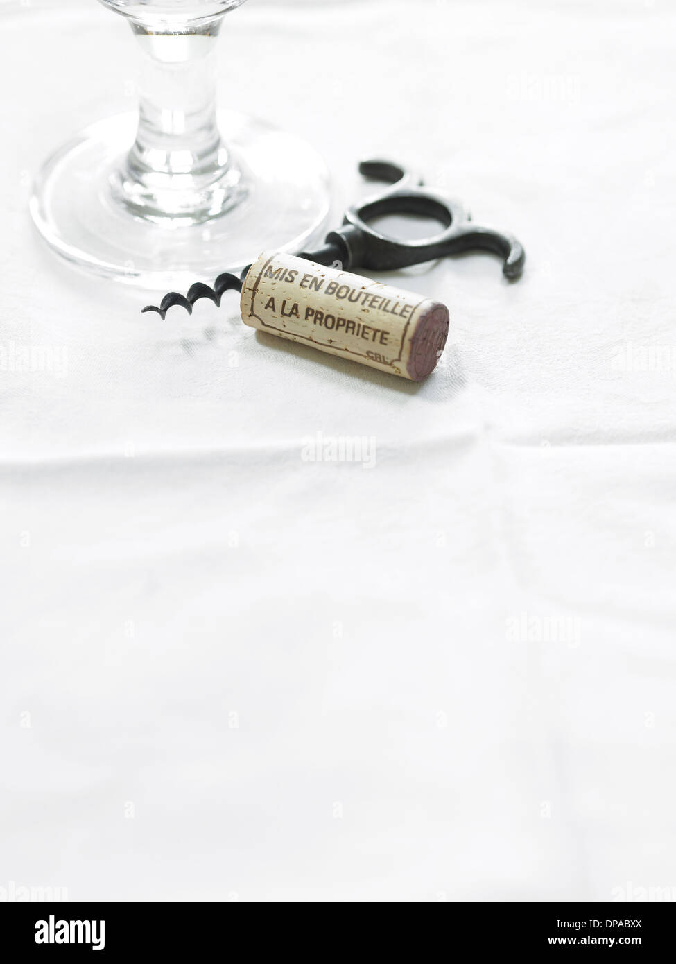 French wine cork, corkscrew and glass Stock Photo - Alamy