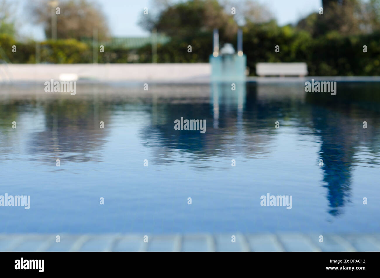 Swimming pool taken from low position with blurred background Stock ...