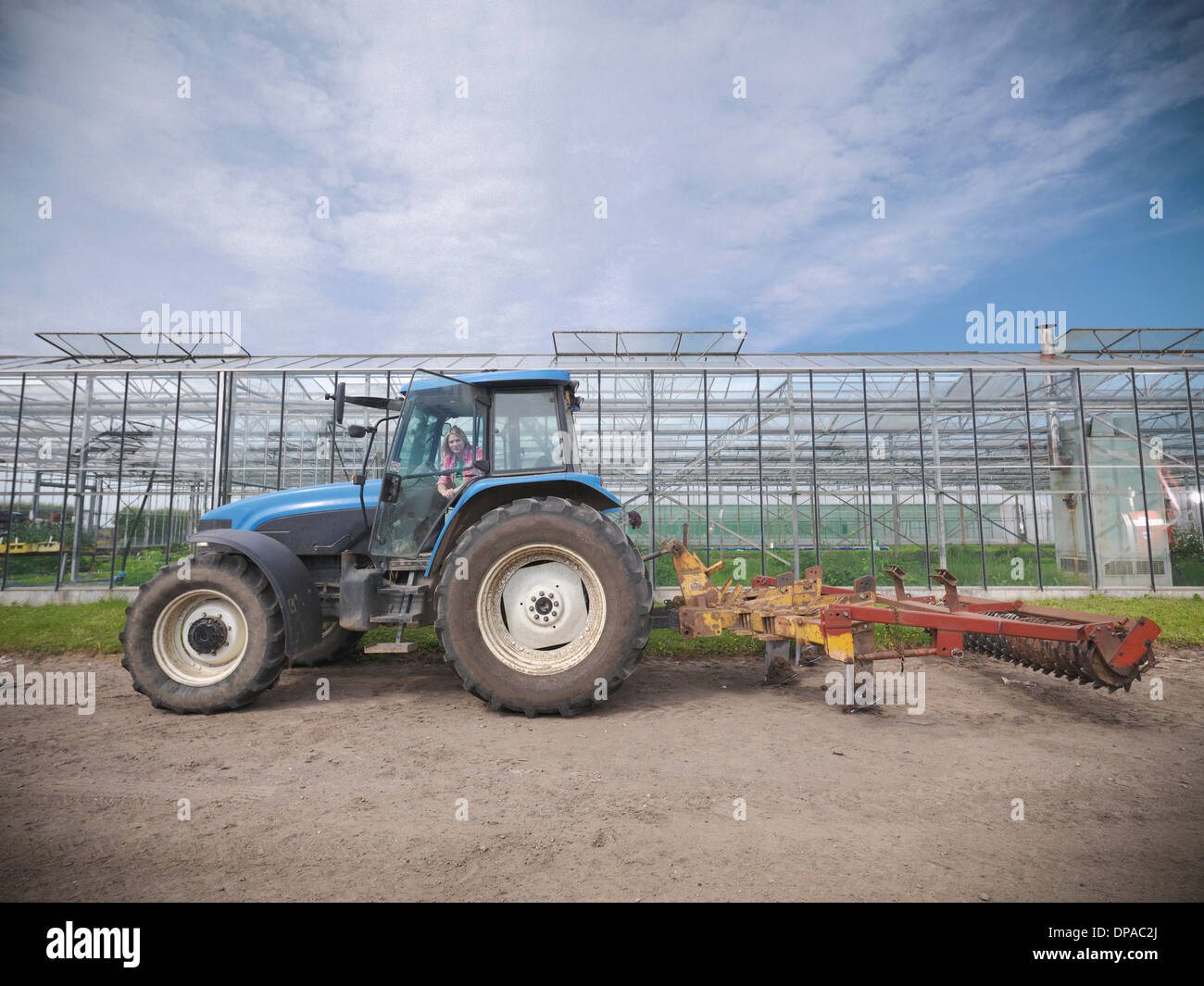 Person on tractor hi-res stock photography and images - Alamy