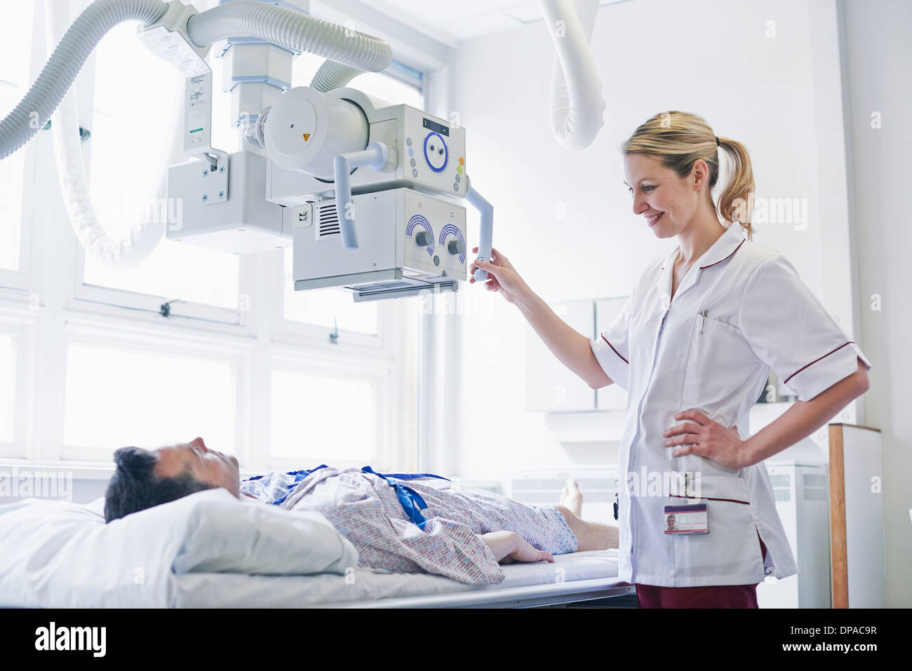 Radiologist scanning patient Stock Photo - Alamy