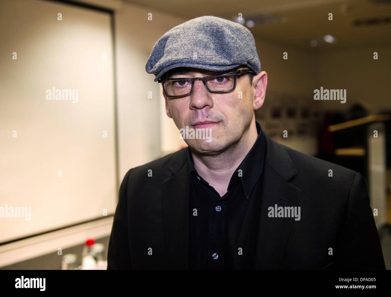 Berlin, Germany. 08th Jan, 2014. The Romanian author Razvan Georgescu ...