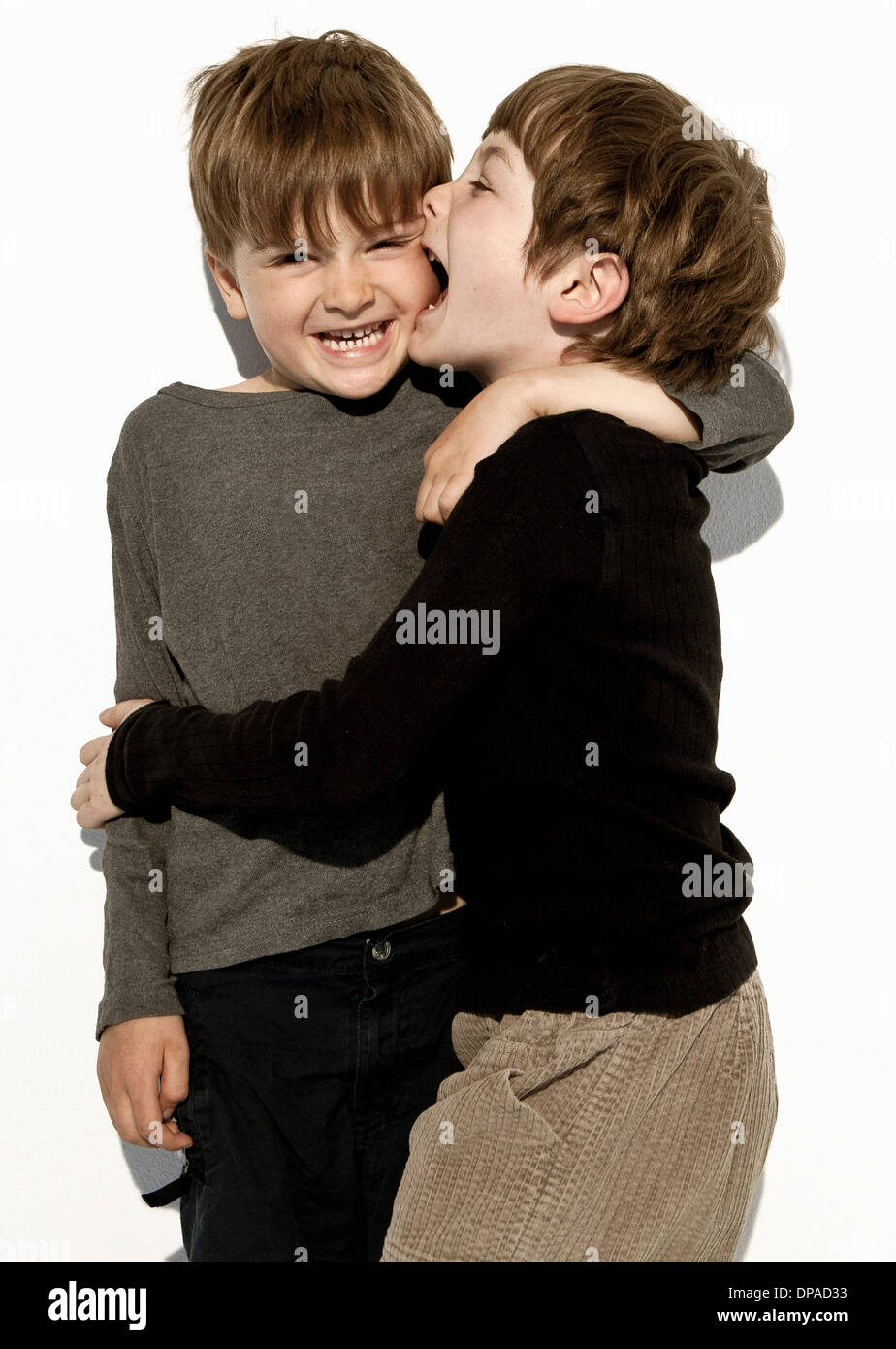 Boy biting hi-res stock photography and images - Alamy