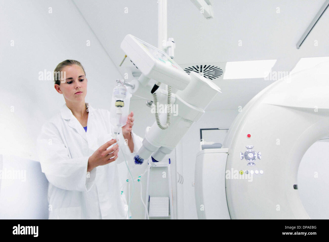 Female doctor checking ct scanner Stock Photo - Alamy