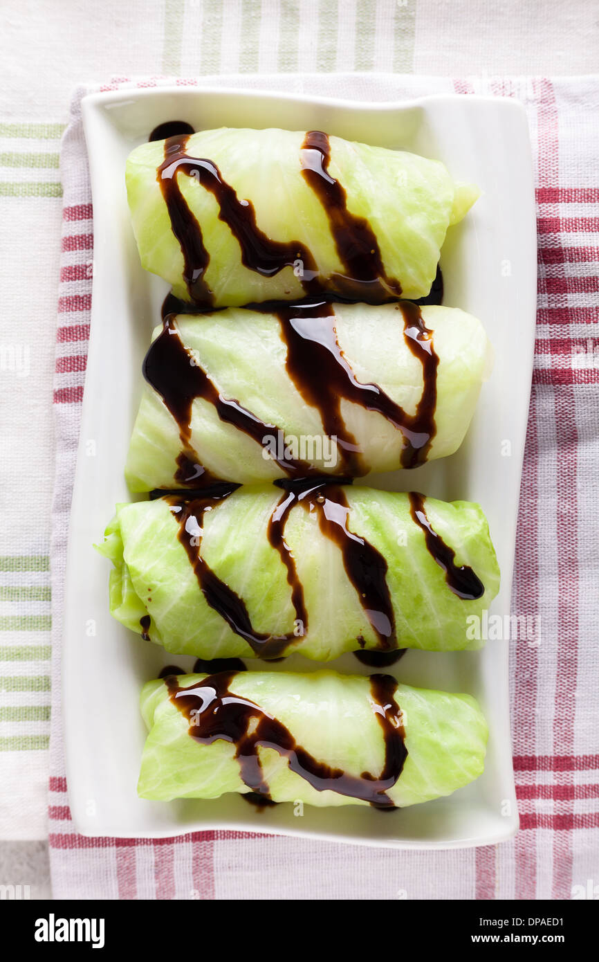 Four Cabbage Rolls with Vinegar Stock Photo - Alamy