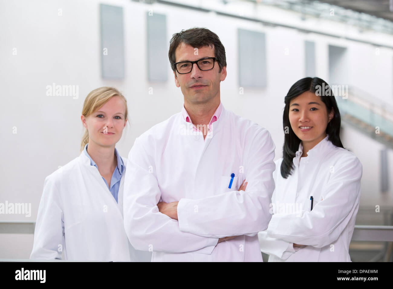 Three scientists hi-res stock photography and images - Alamy